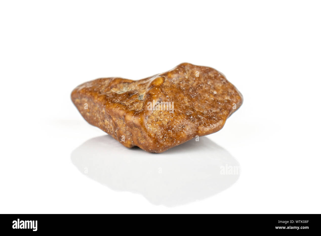 One whole brown sweet chocolate stone isolated on white background ...