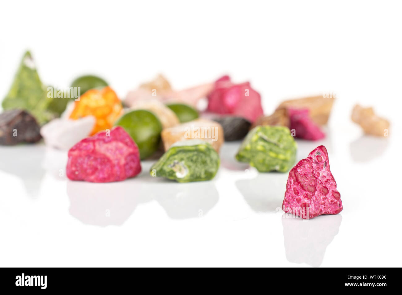 Lot of whole sweet chocolate stone in small group isolated on white ...