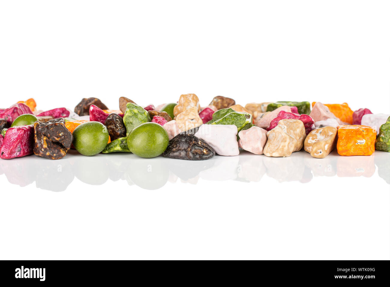 Lot of whole sweet chocolate stone in large group isolated on white ...