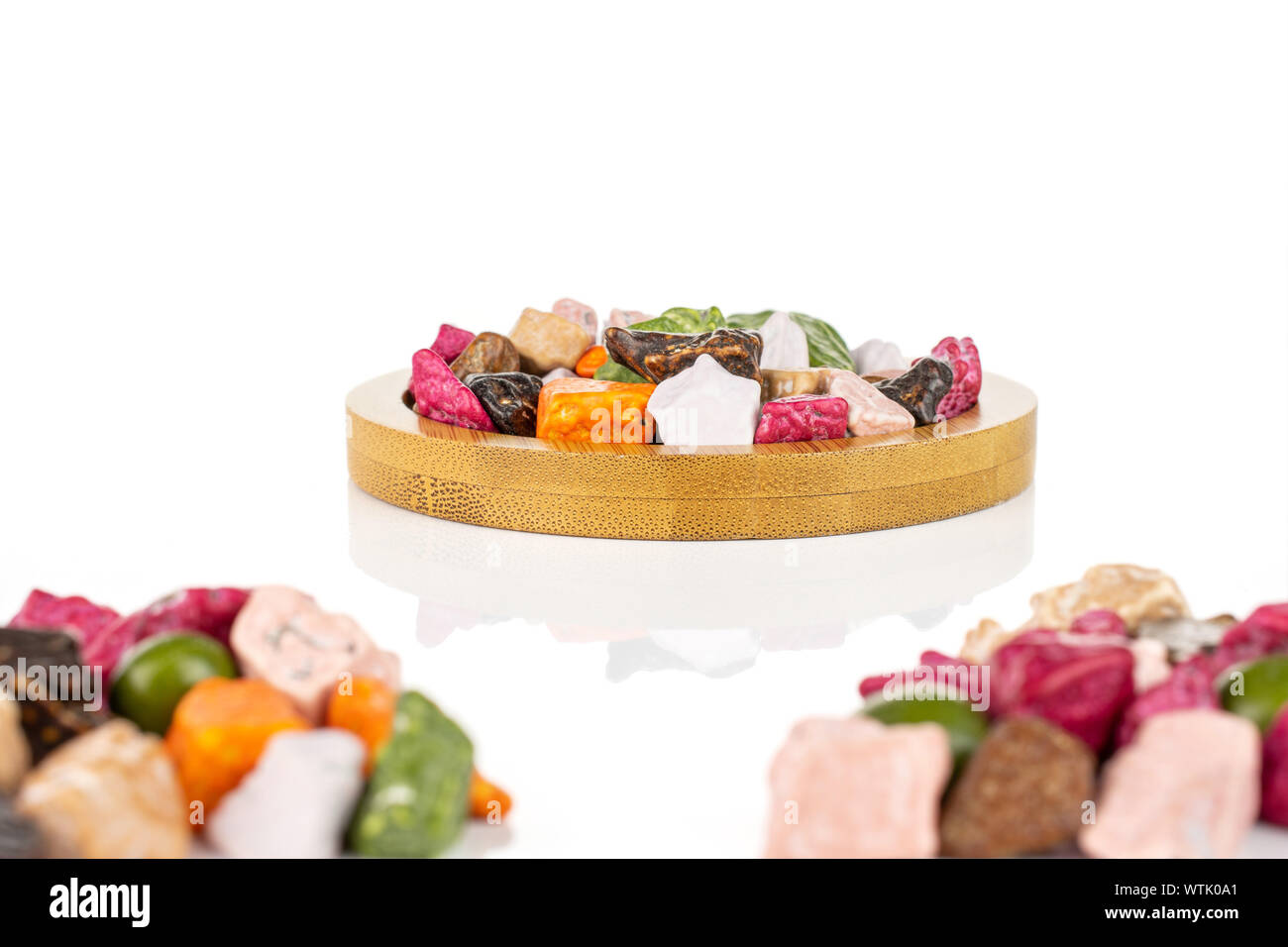 Lot of whole sweet chocolate stone two small groups are in the front ...