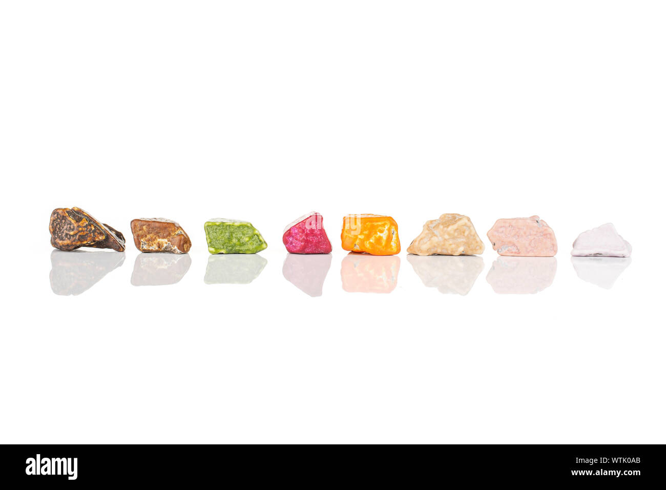 Group of eight whole sweet chocolate stone isolated on white background ...