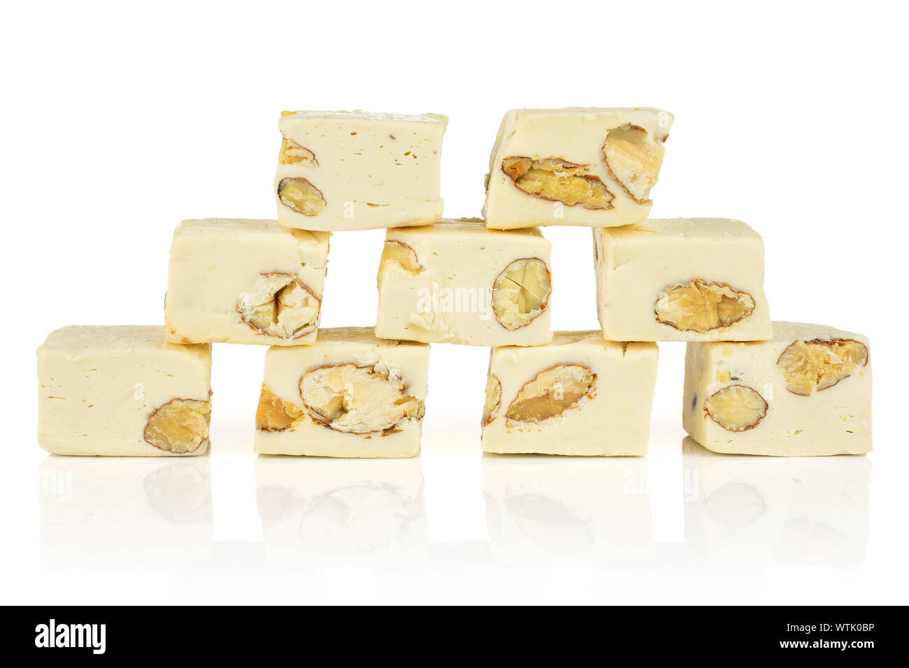 Lot of whole sweet white nougat isolated on white background Stock ...