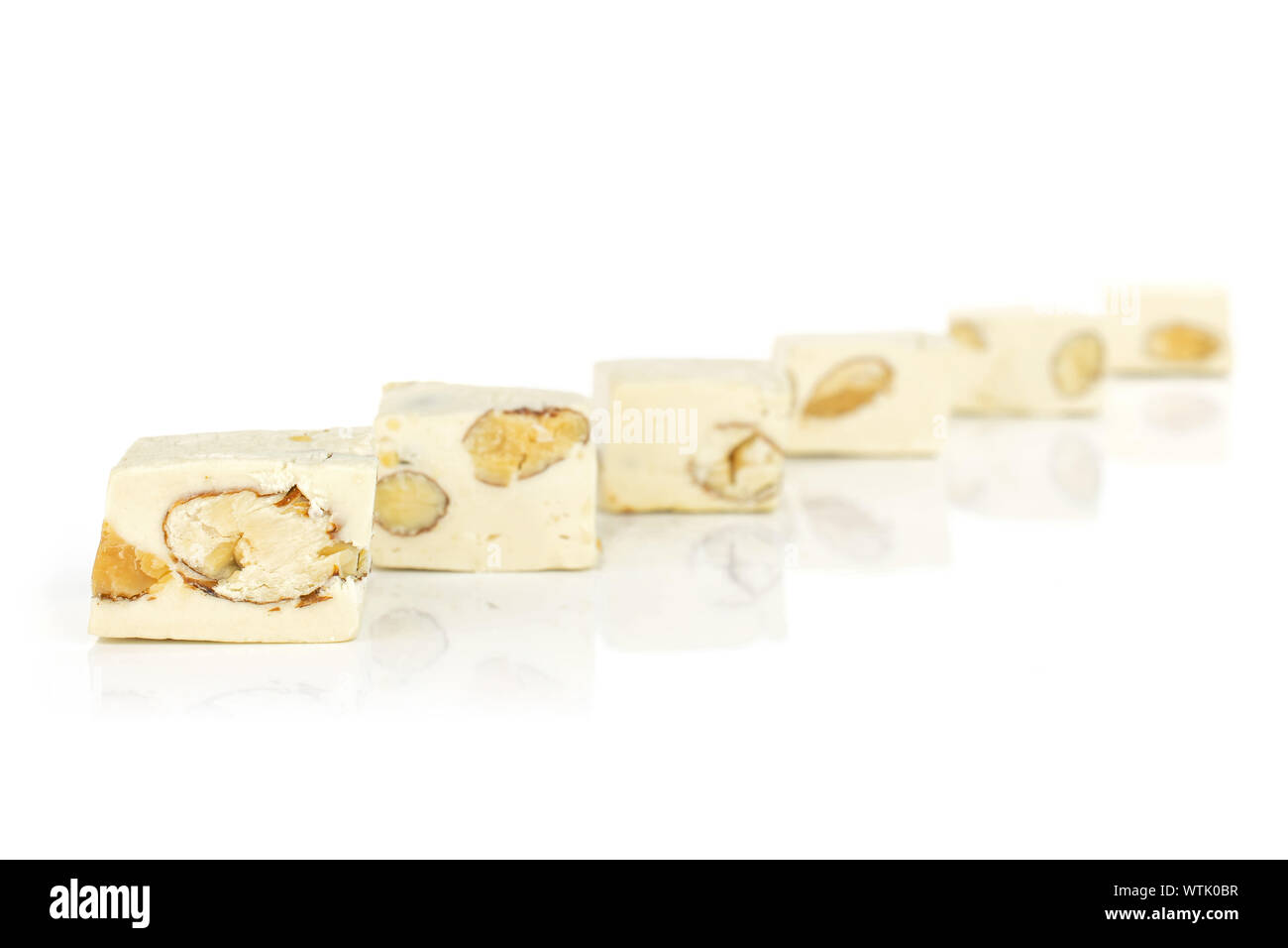 Group of six whole sweet white nougat isolated on white background ...