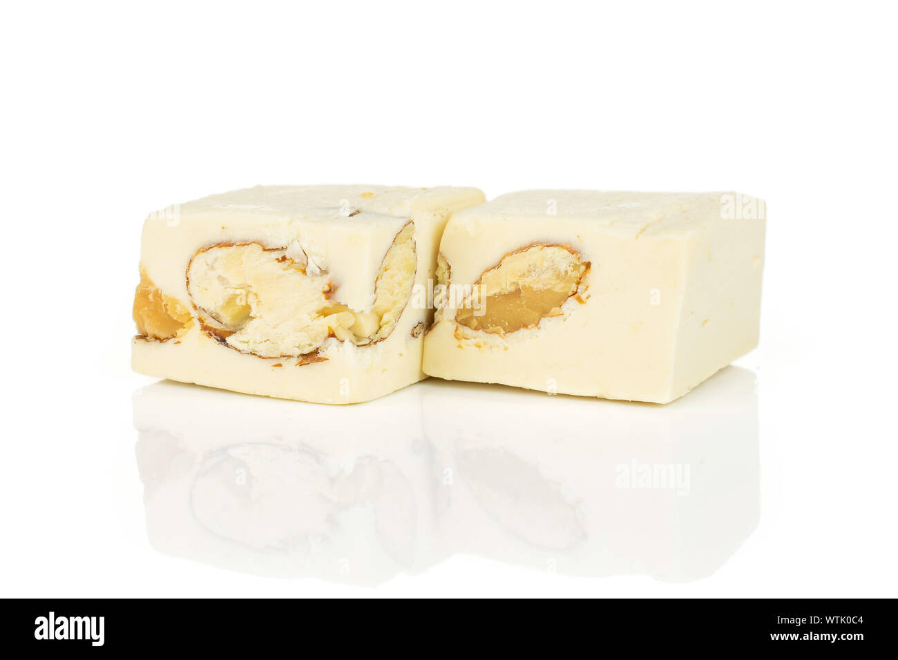 Group of two whole sweet white nougat isolated on white background ...