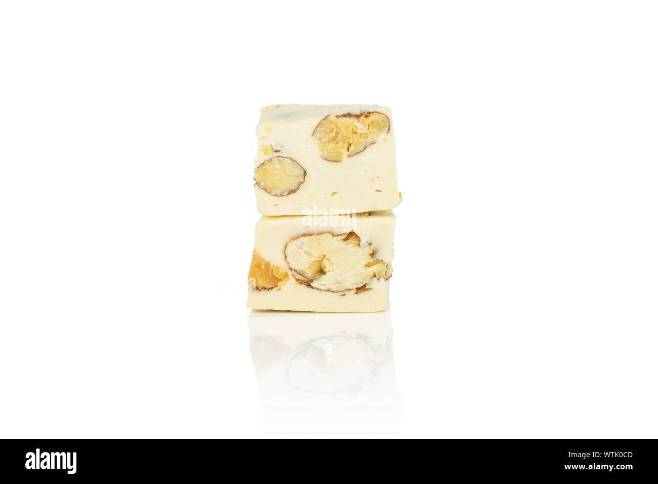 Group of two whole sweet white nougat isolated on white background ...