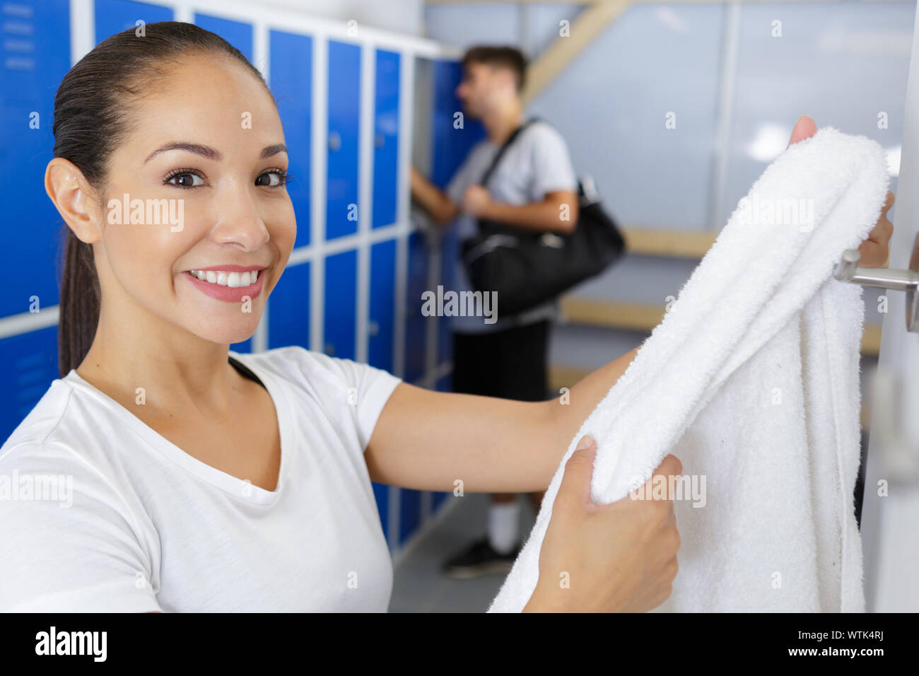 Woman getting dressed locker room hi-res stock photography and images ...