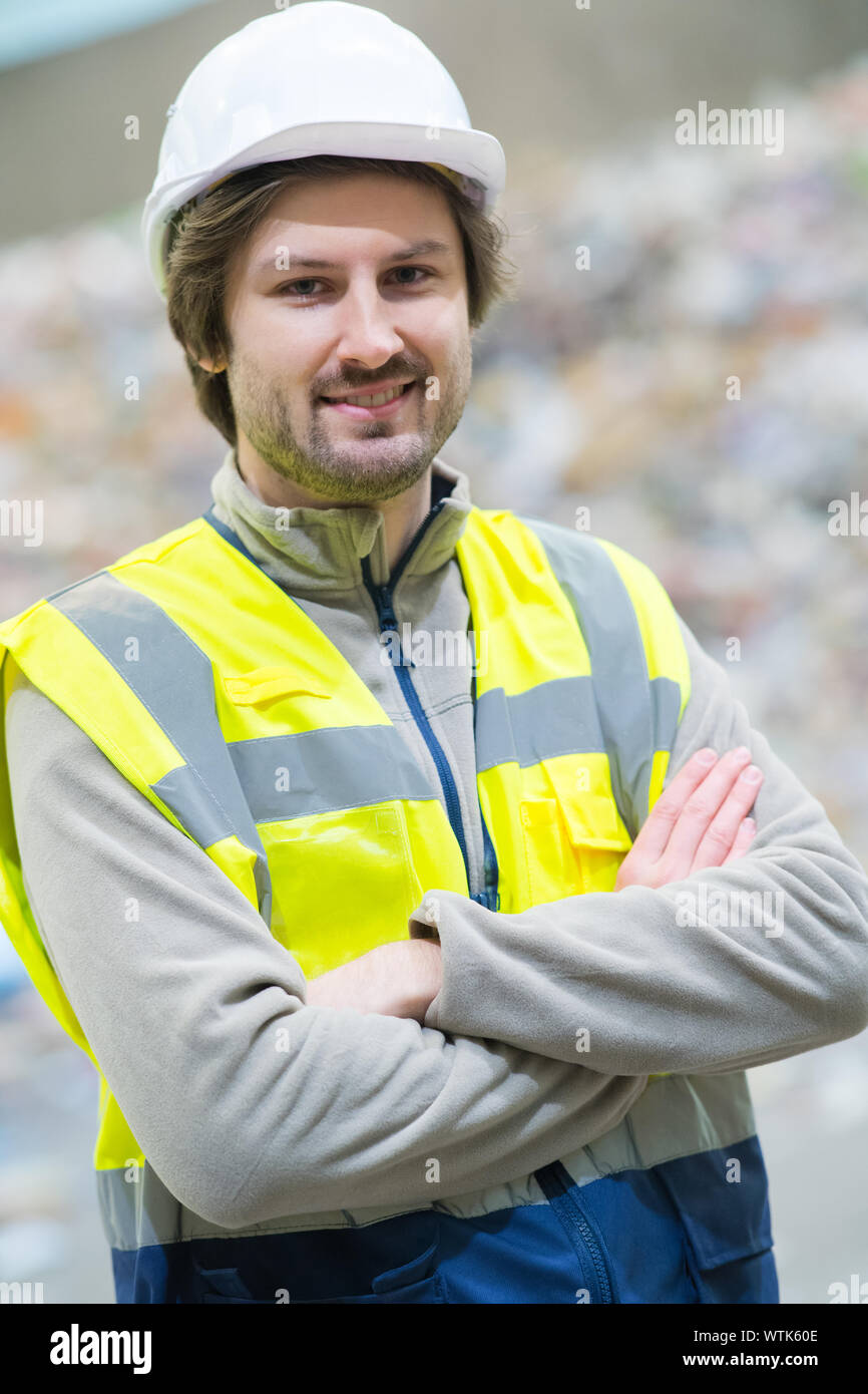 portrait of sanitation worker in recycling plant Stock Photo - Alamy
