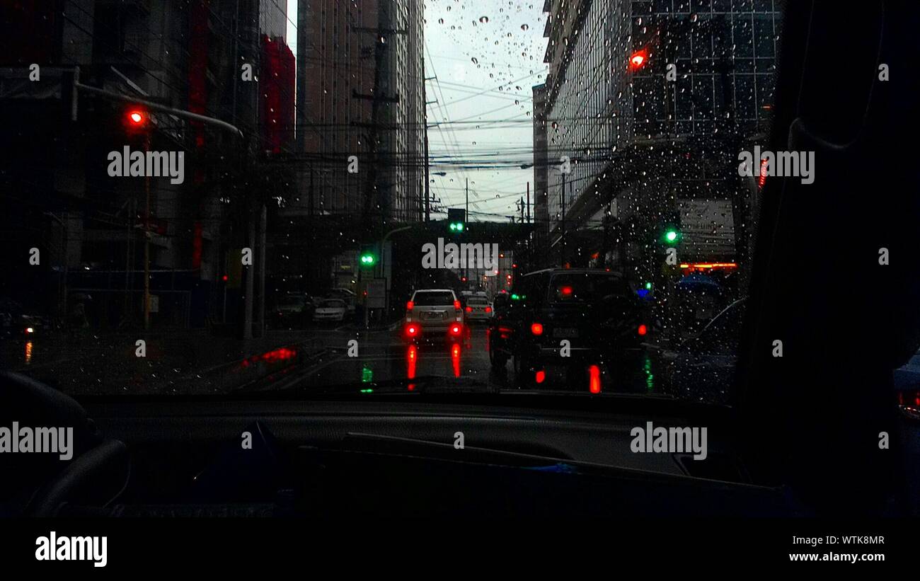 Car traffic as seen through wet window car hi-res stock photography and ...