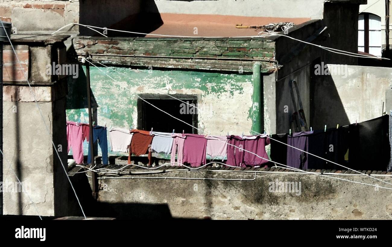Old house drying laundry hi-res stock photography and images - Alamy