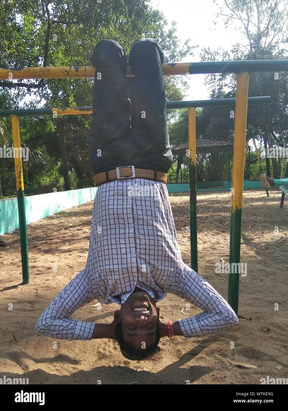 Man Hanging Upside Down High Resolution Stock Photography and Images ...