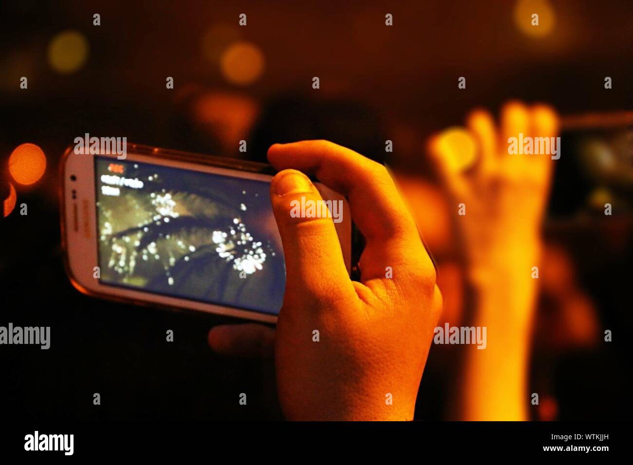 Mobile watching video hi-res stock photography and images - Alamy