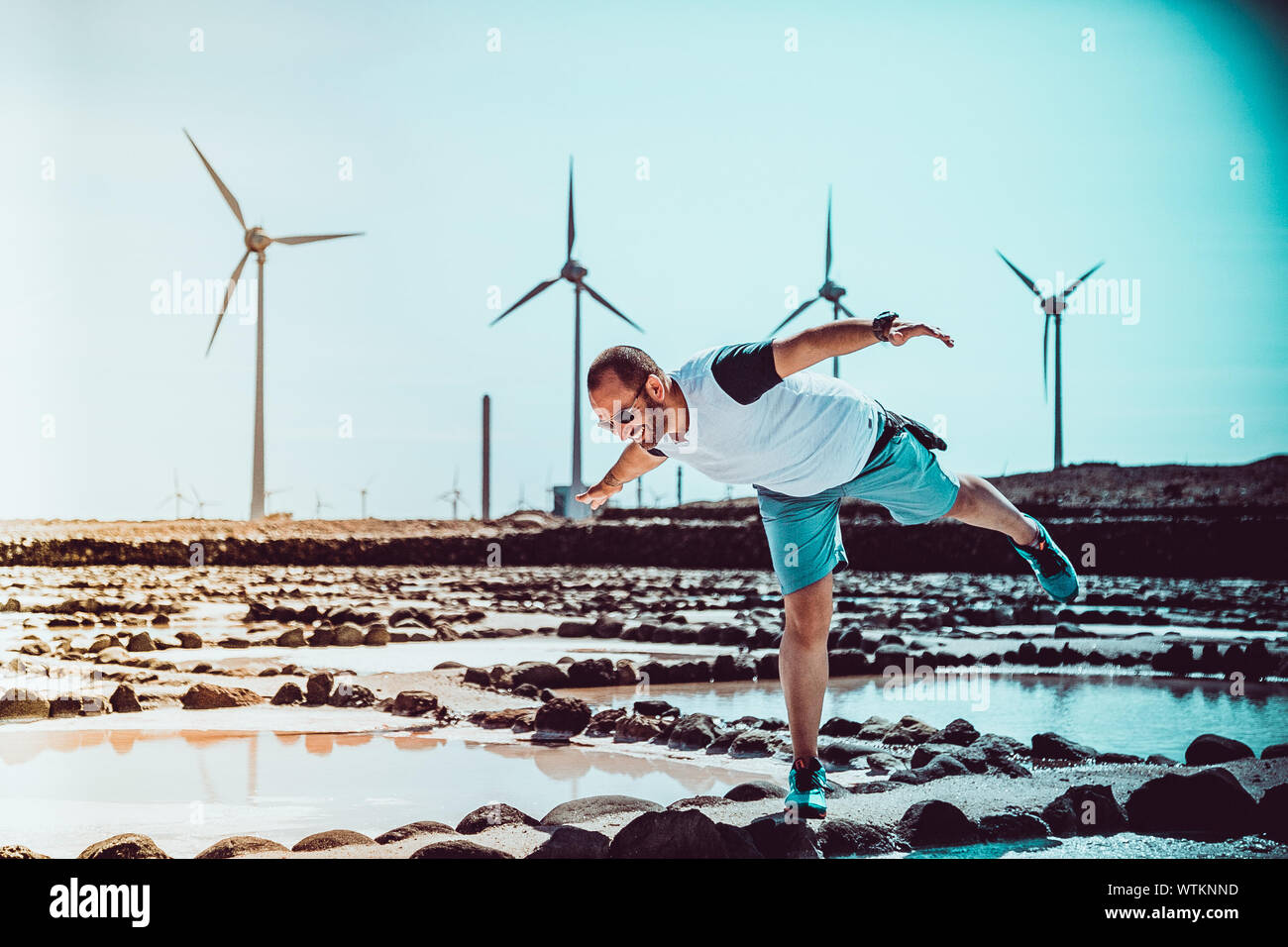 Man balancing on rock hi-res stock photography and images - Alamy