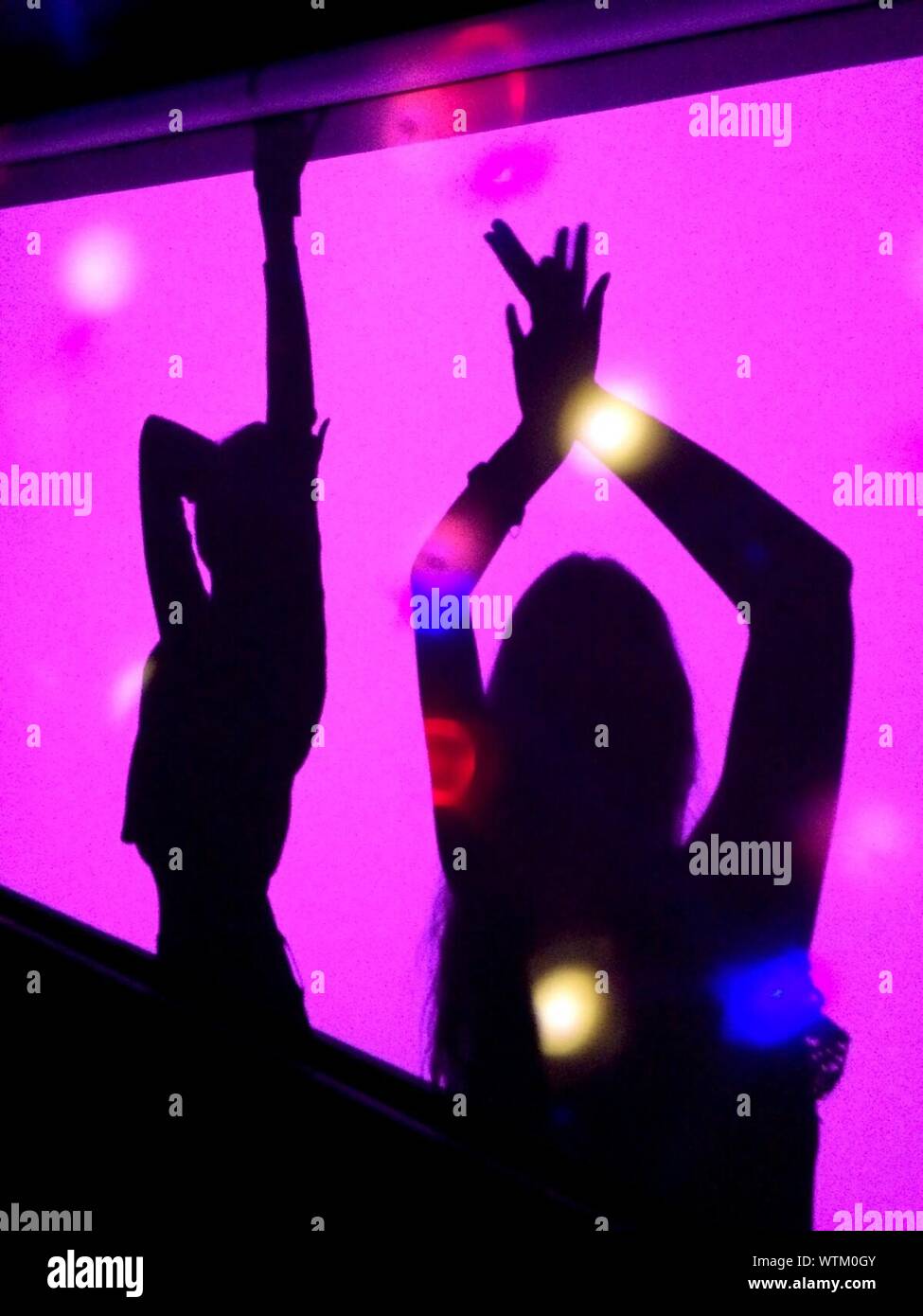 Women dancing nightclub not smiling hi-res stock photography and images ...