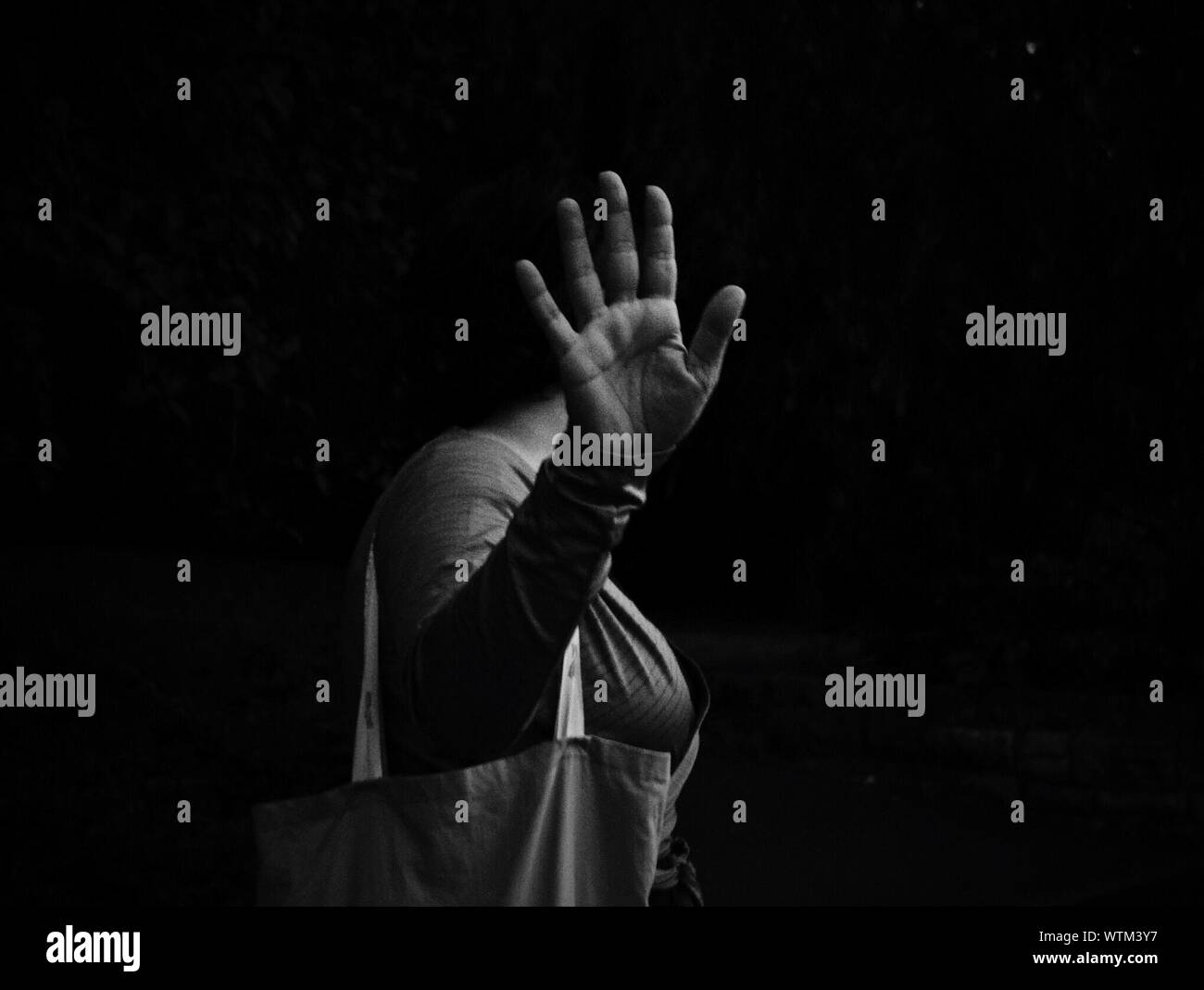 Human face hand hi-res stock photography and images - Alamy