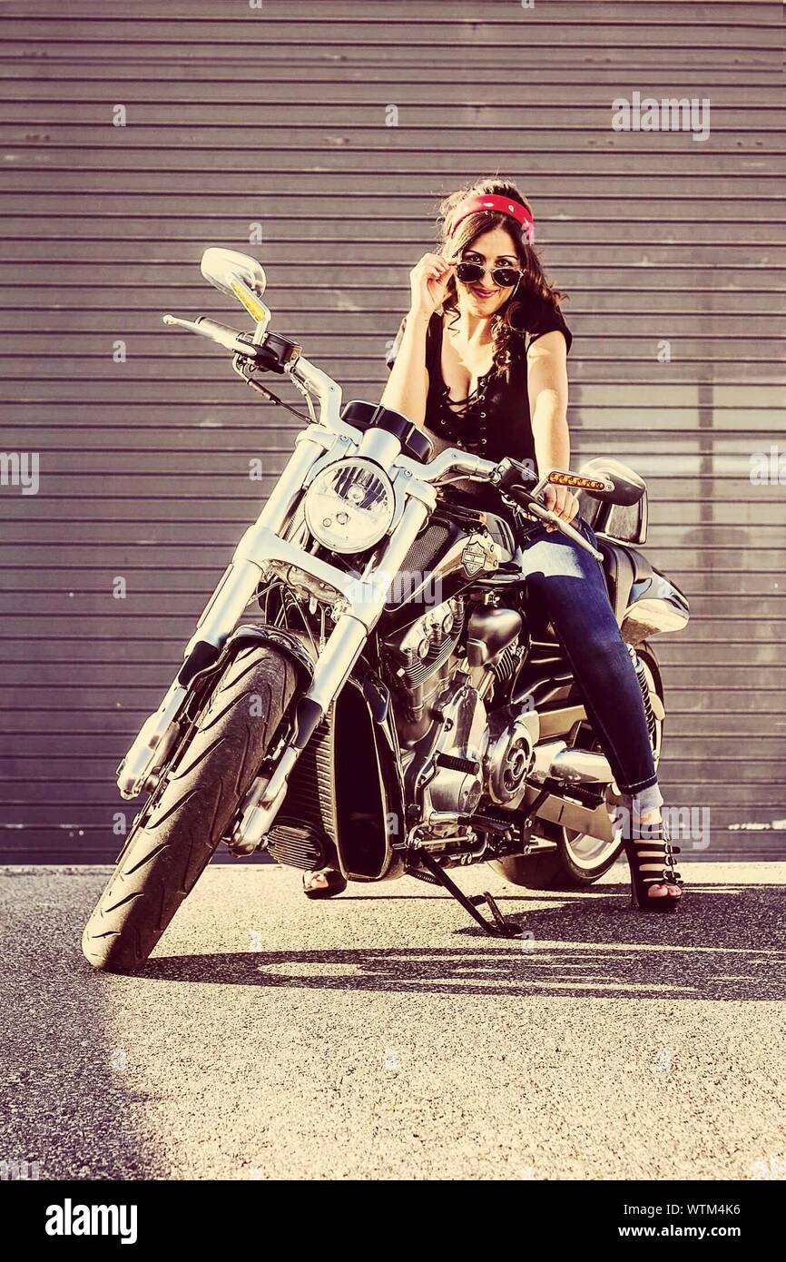 Posing with motorcycle hi-res stock photography and images - Alamy