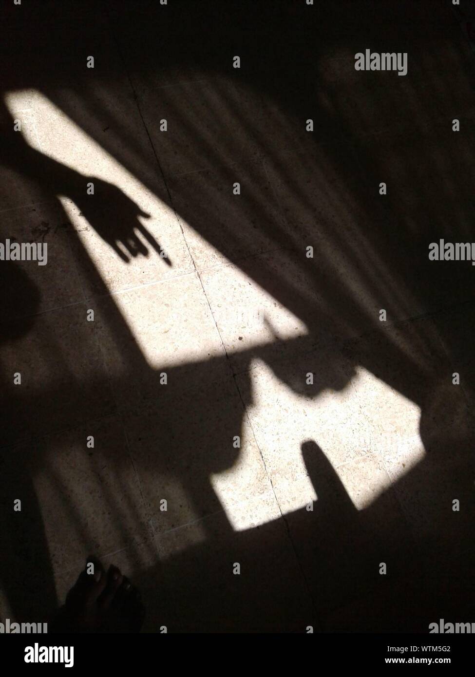 Low angle floor shadow hi-res stock photography and images - Alamy