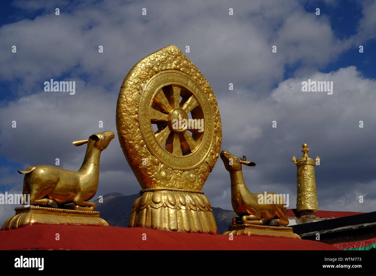 Gold dharma wheel hi-res stock photography and images - Alamy