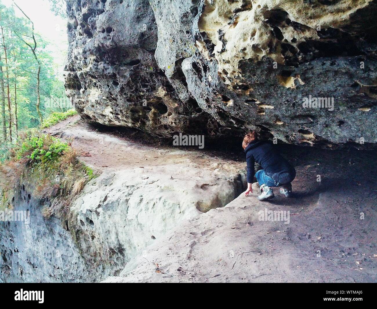 Rear view crouching woman High Resolution Stock Photography and Images ...