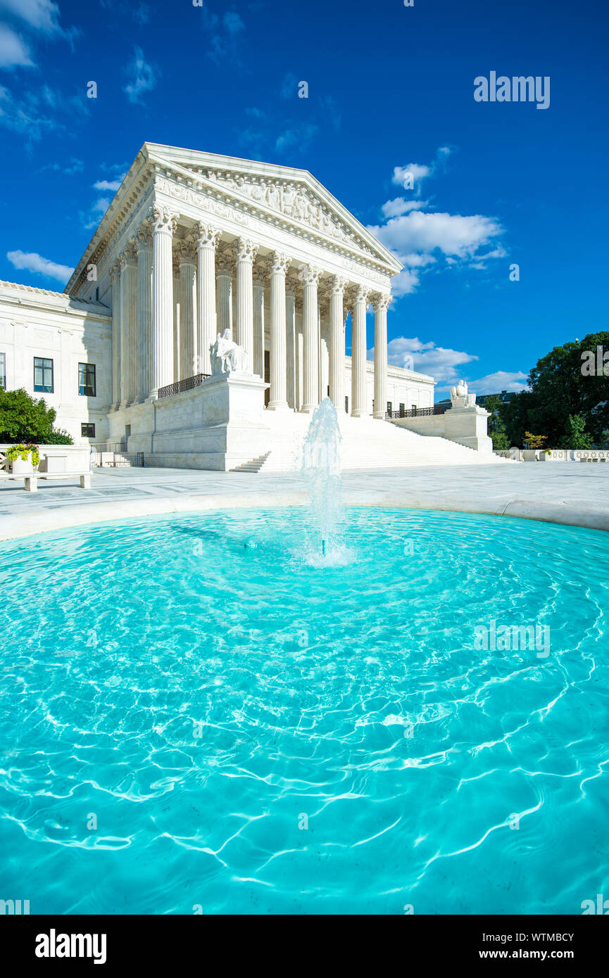 Bright scenic view of the Neoclassical columned entrance portico to the ...