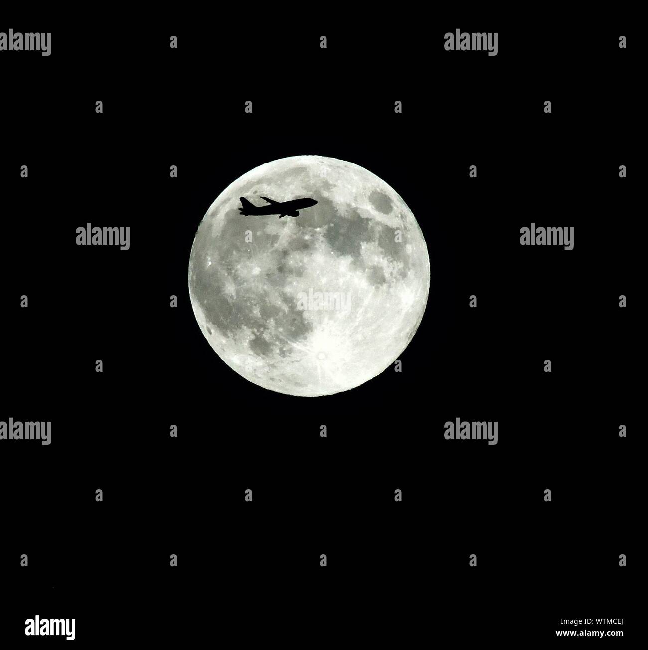 Airplane Sky Night Full Moon High Resolution Stock Photography and ...