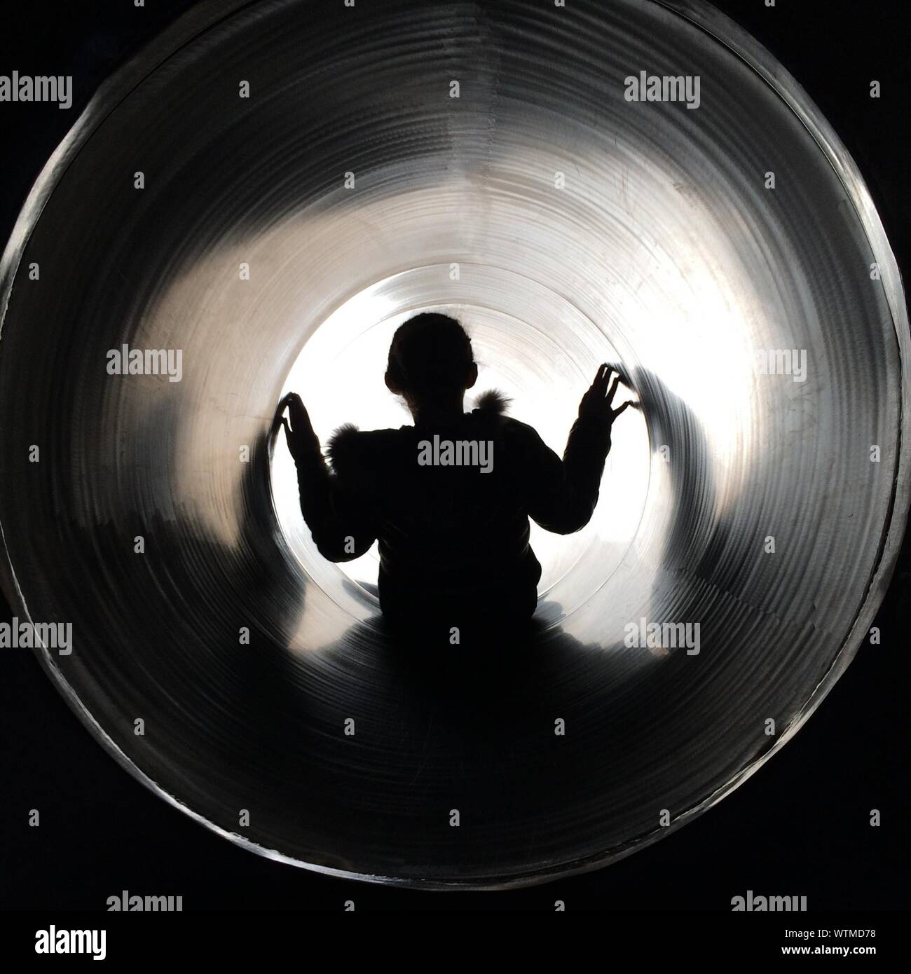 Girl in tube hi-res stock photography and images - Alamy