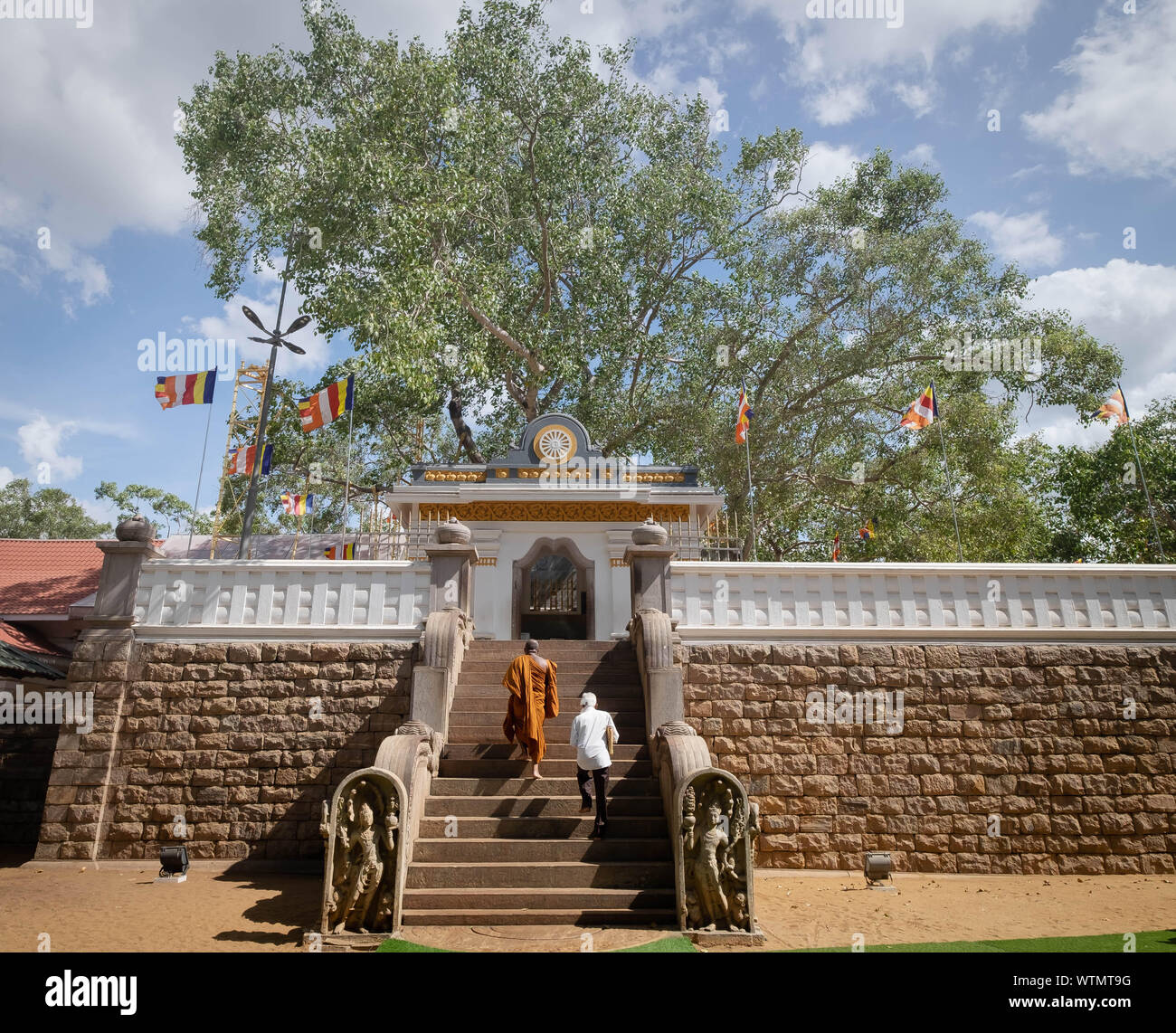 Anuradhapura/ Sri Lanka - AUGUST 07, 2019: Unspecific monk and one man ...