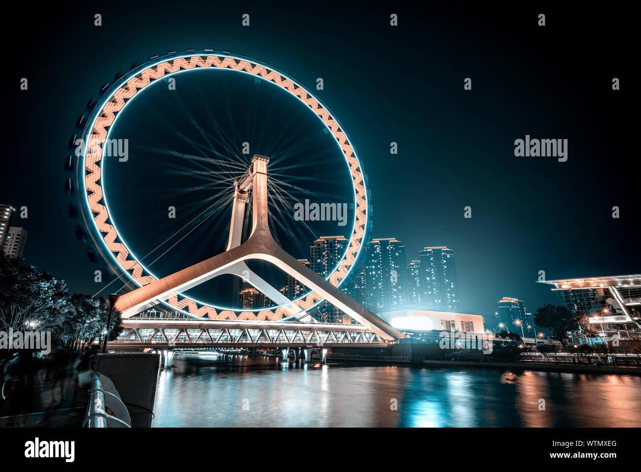 Night scene cityscape of Tianjin ferris wheel,Tianjin eyes in twilight ...