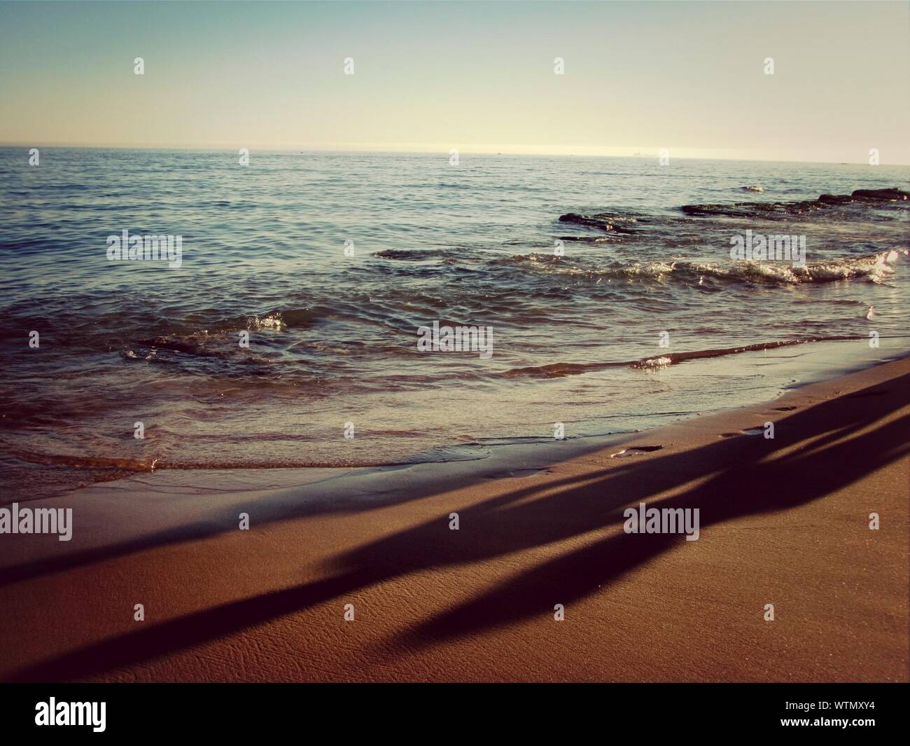 Water washing up on beach hi-res stock photography and images - Alamy