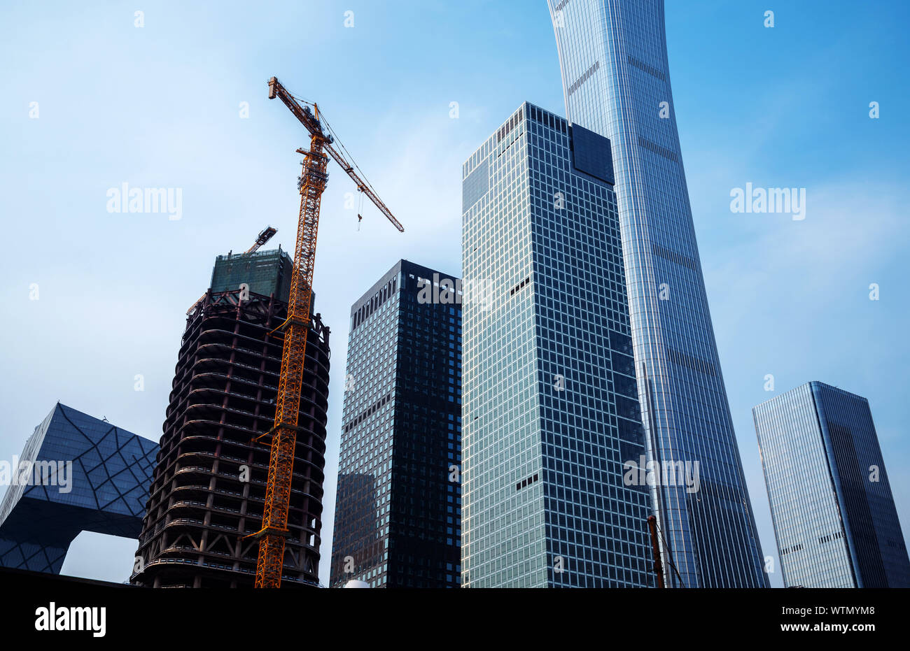 Building construction site, tall skyscrapers and cranes Stock Photo - Alamy