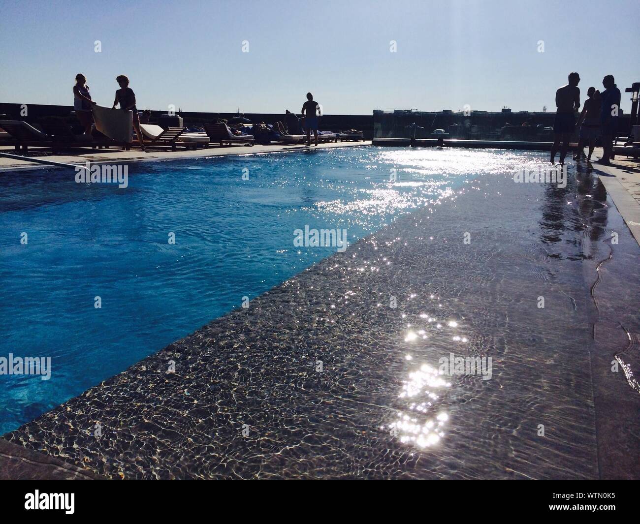 Group by the pool hi-res stock photography and images - Alamy