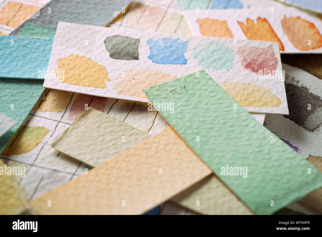 Watercolor test cards on a table Stock Photo - Alamy