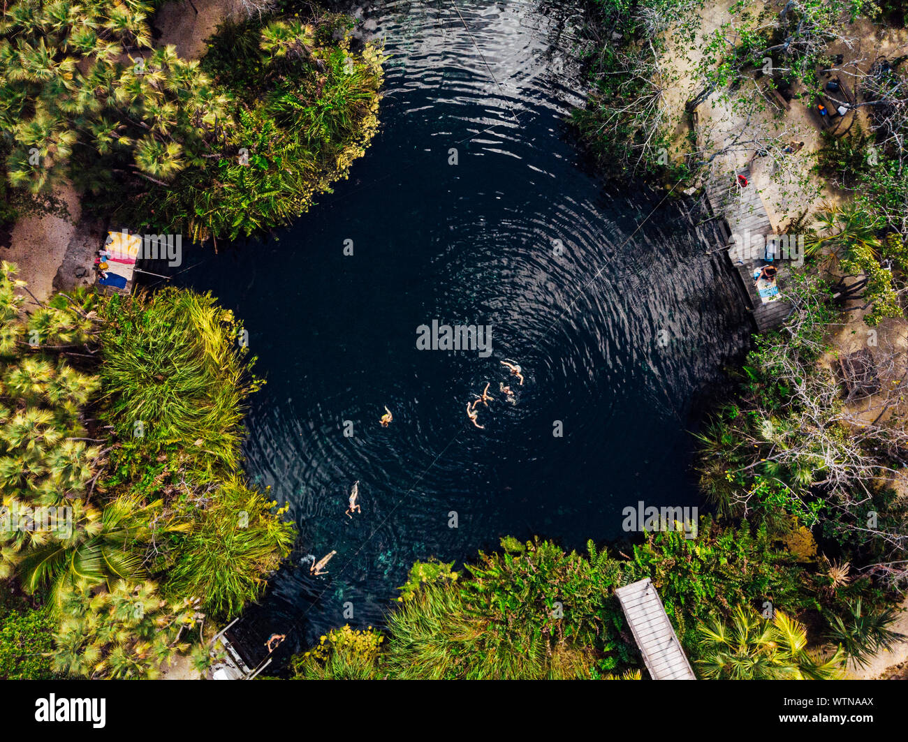 People swimming in cenote hi-res stock photography and images - Alamy