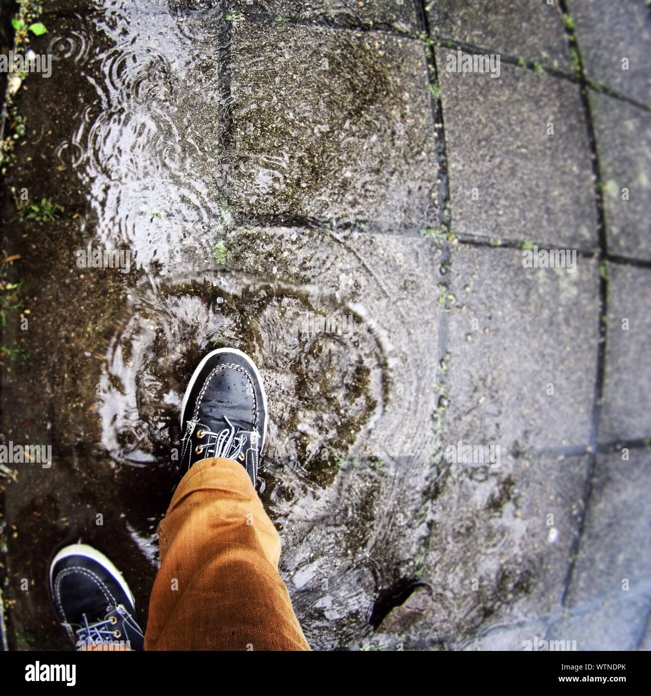 Man standing in shallow water hi-res stock photography and images - Alamy