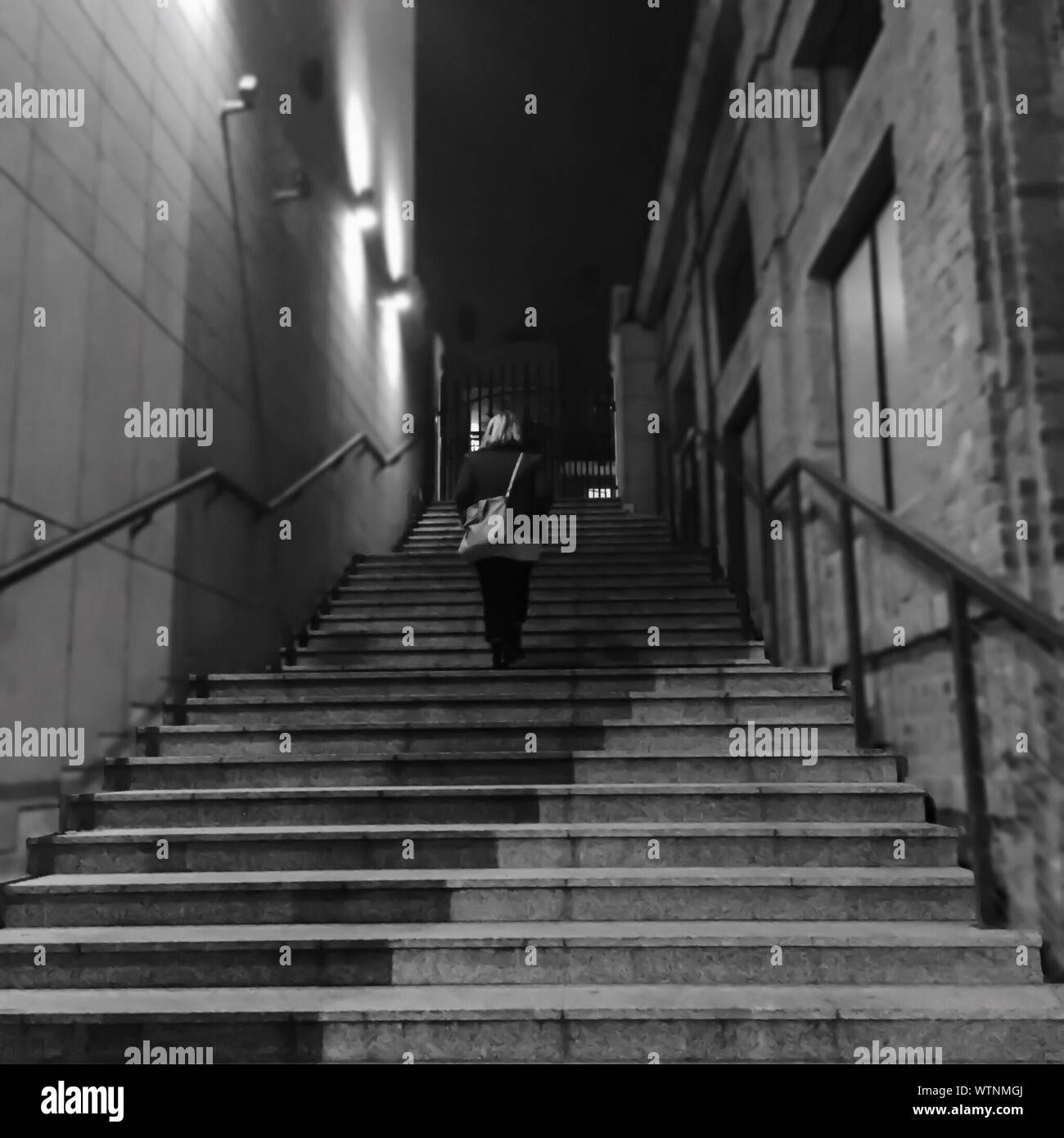 Person Walking Upstairs High Resolution Stock Photography and Images ...