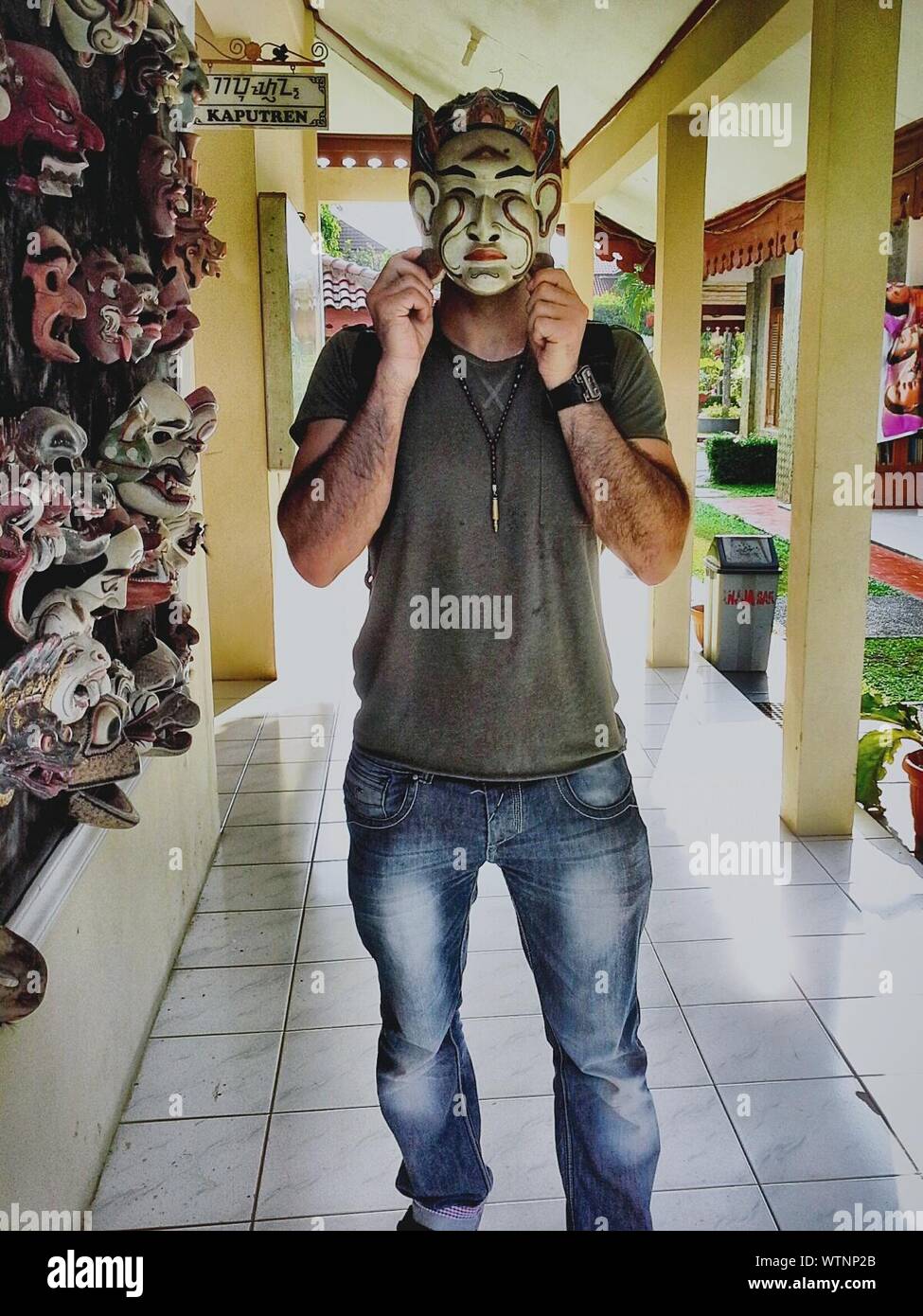 Man holding mask hi-res stock photography and images - Alamy