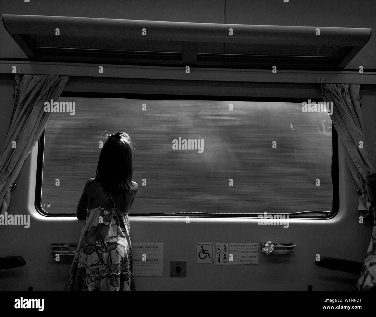 Train girls window hi-res stock photography and images - Alamy