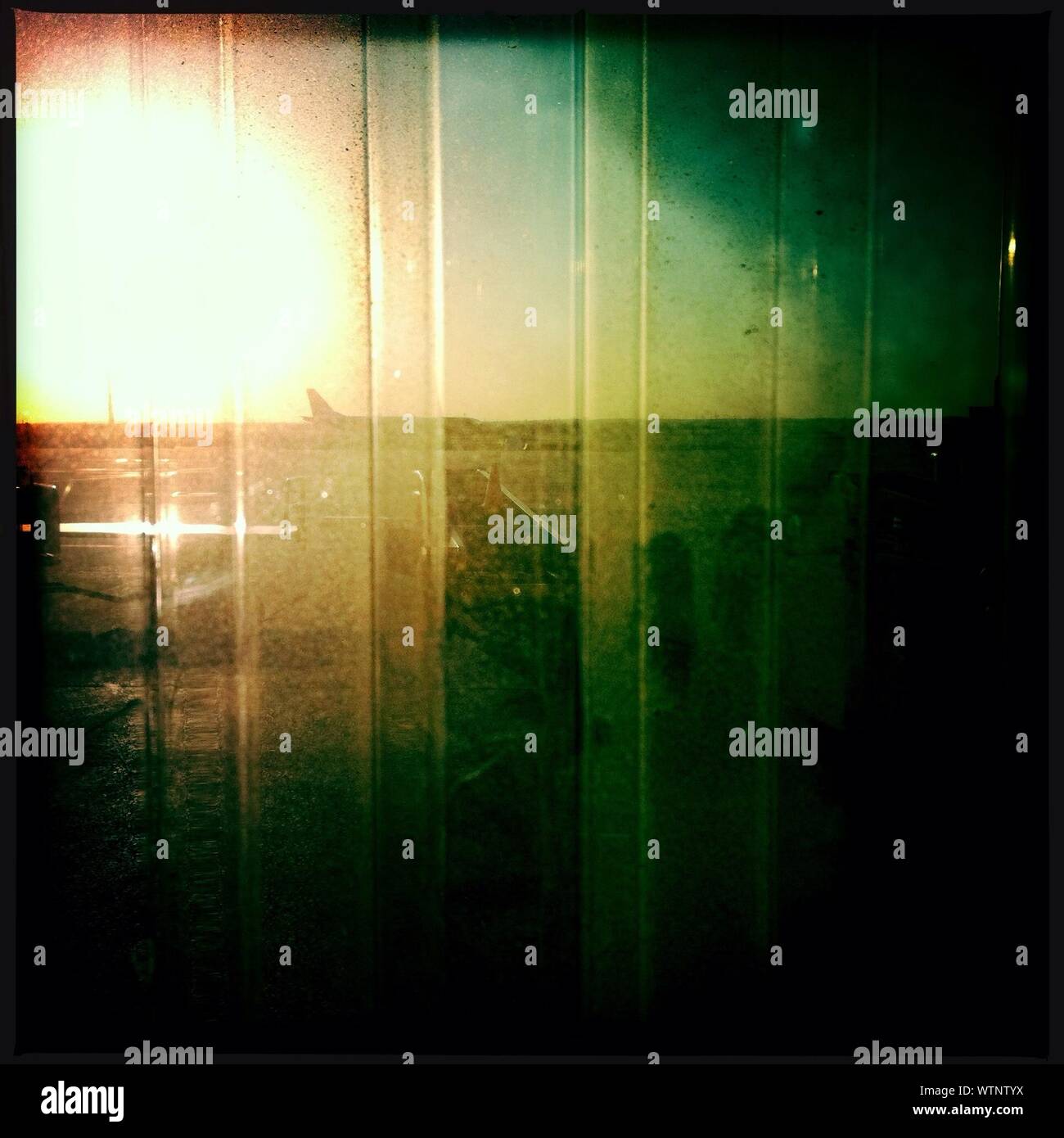 Plane over runway hi-res stock photography and images - Alamy