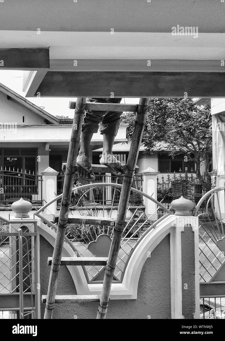 Repair man ladder hi-res stock photography and images - Alamy