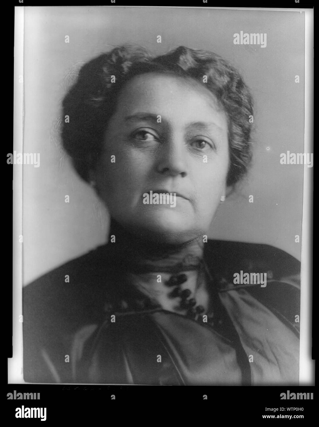 Mrs. Benjamin Harrison, three-quarters length portrait, seated, facing ...