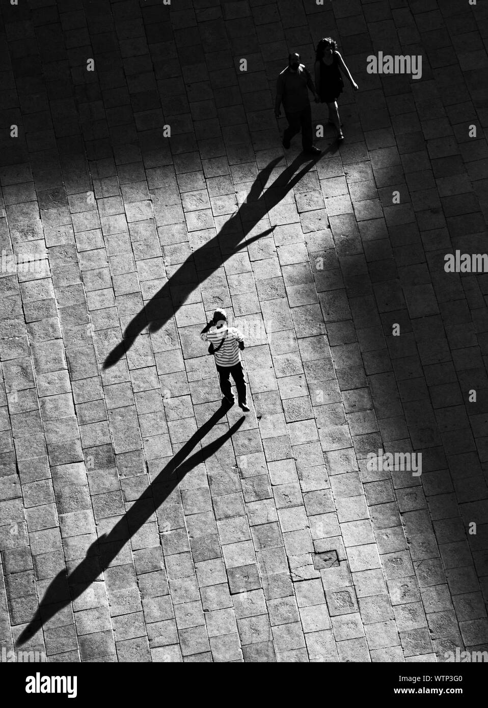Walking shadow hi-res stock photography and images - Alamy