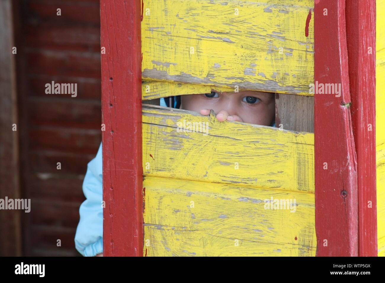 Window peeping hi-res stock photography and images - Alamy