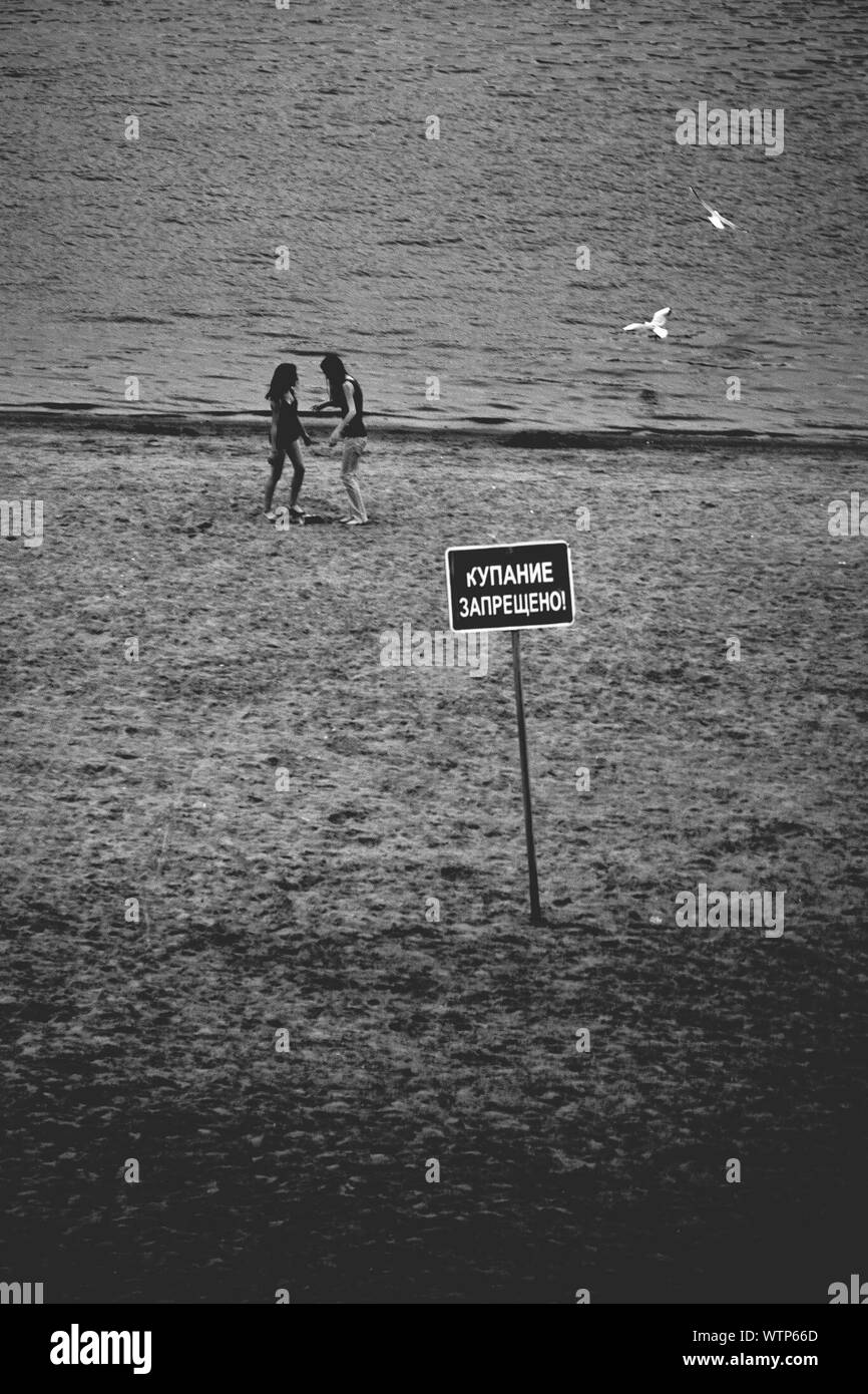Two women at beach hi-res stock photography and images - Alamy