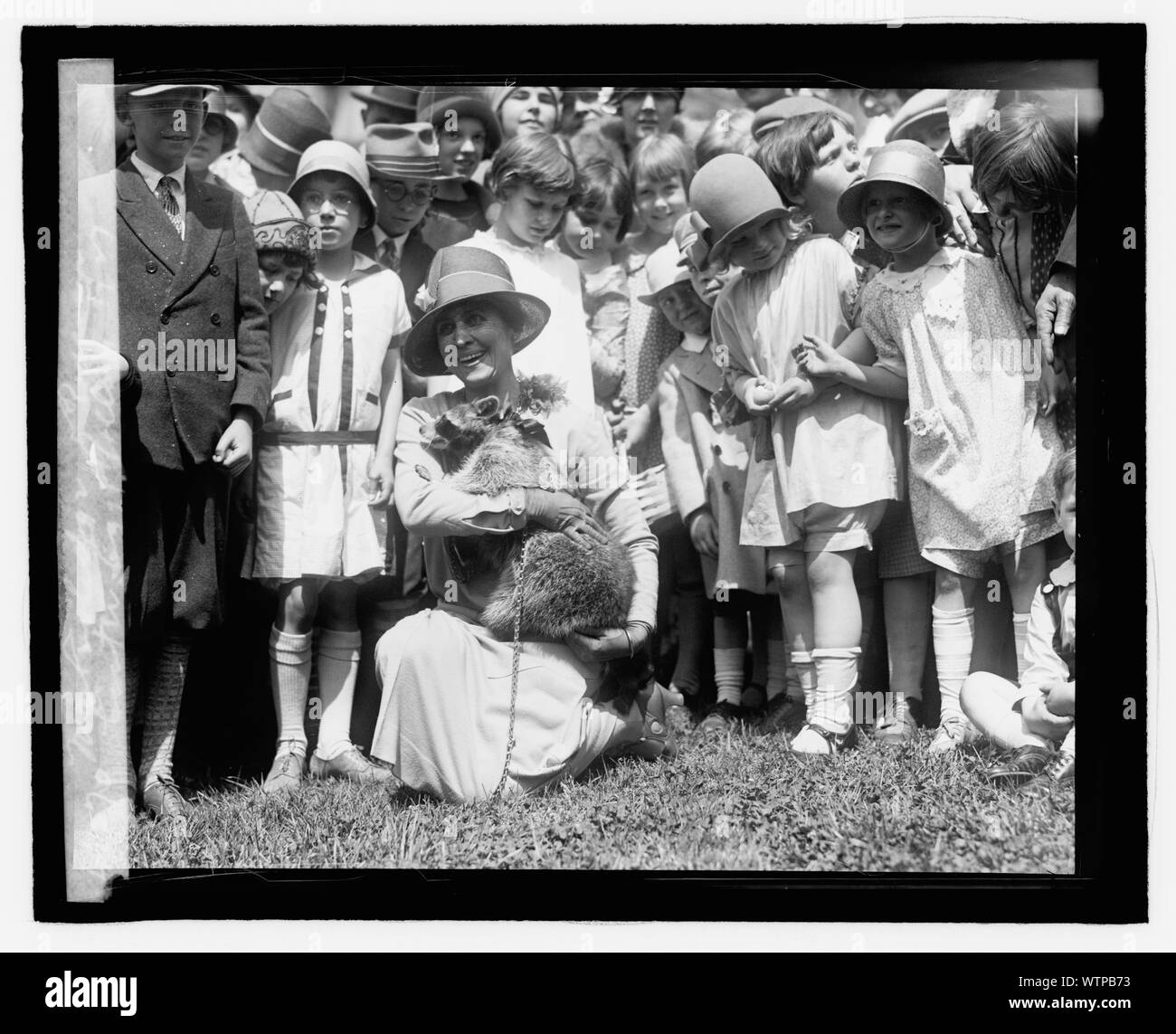 Mrs. Coolidge & raccoon [Rebecca], Easter egg rolling, 1927 Stock Photo ...