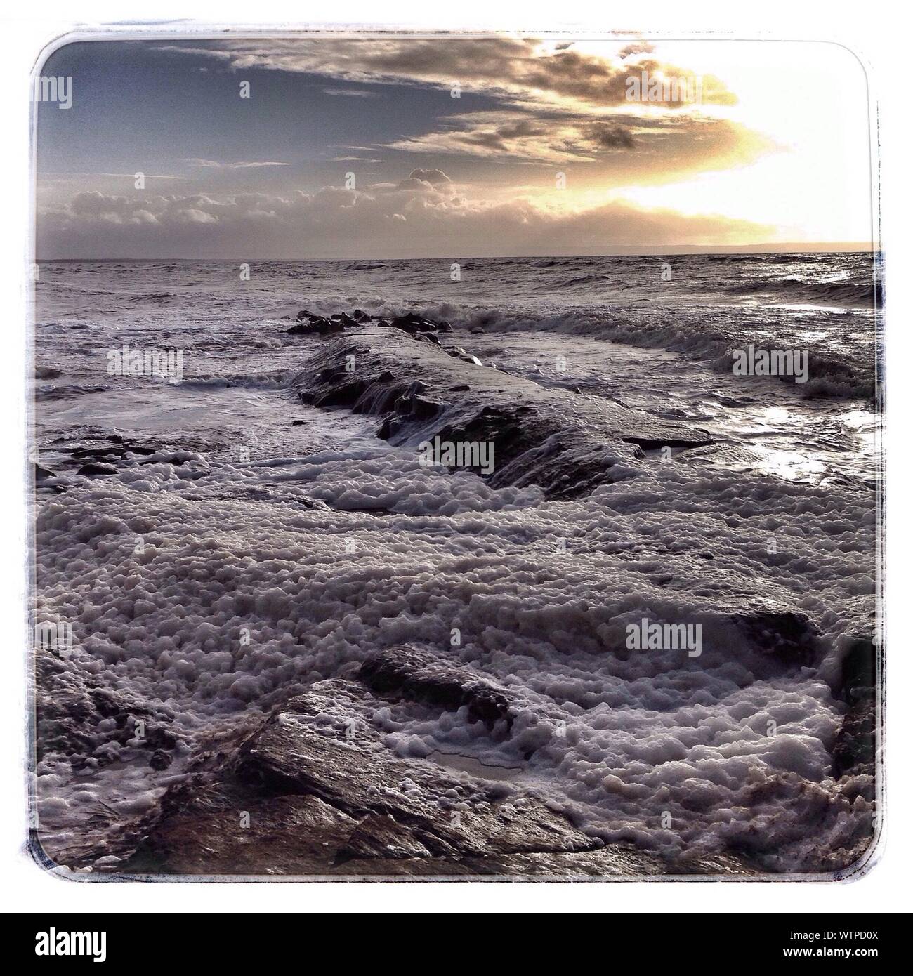 Wave and sunset Cut Out Stock Images & Pictures - Alamy