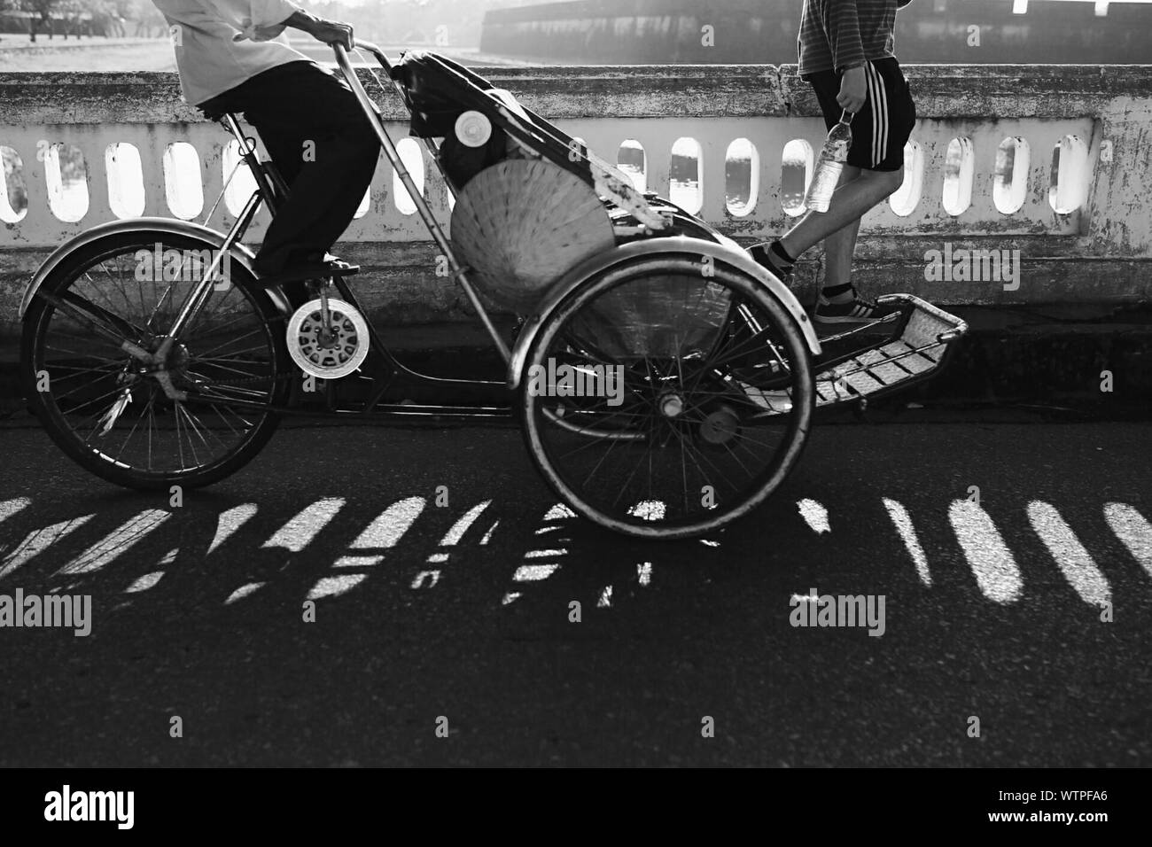 Man riding tricycle hi-res stock photography and images - Alamy