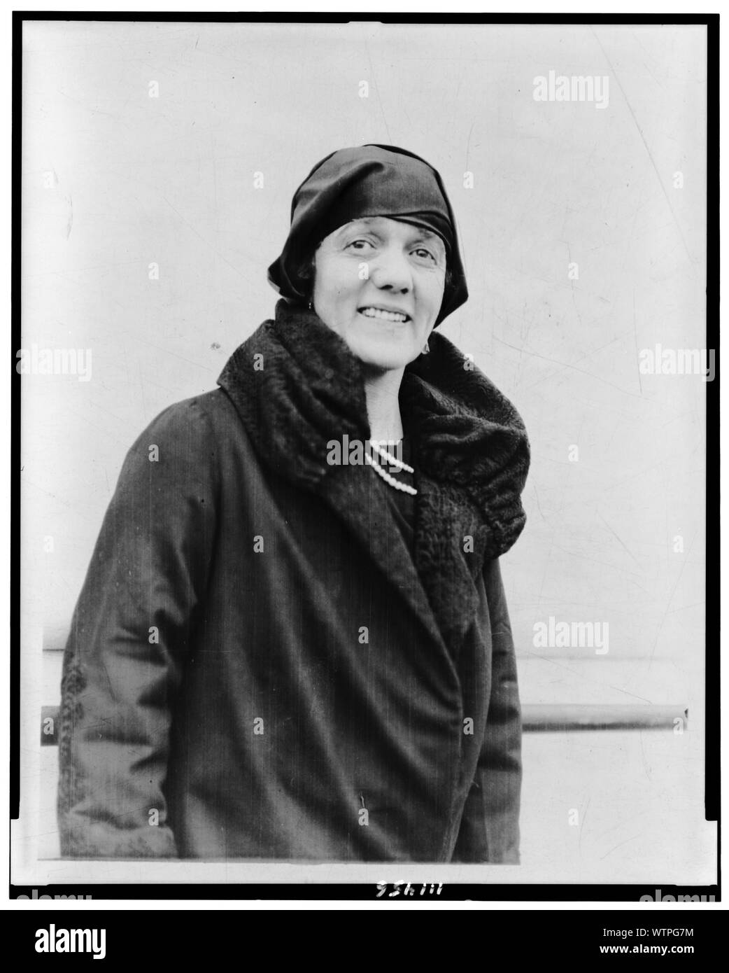 Mrs. Dorothy Harrison Eustis, half-length portrait, standing, on ship ...