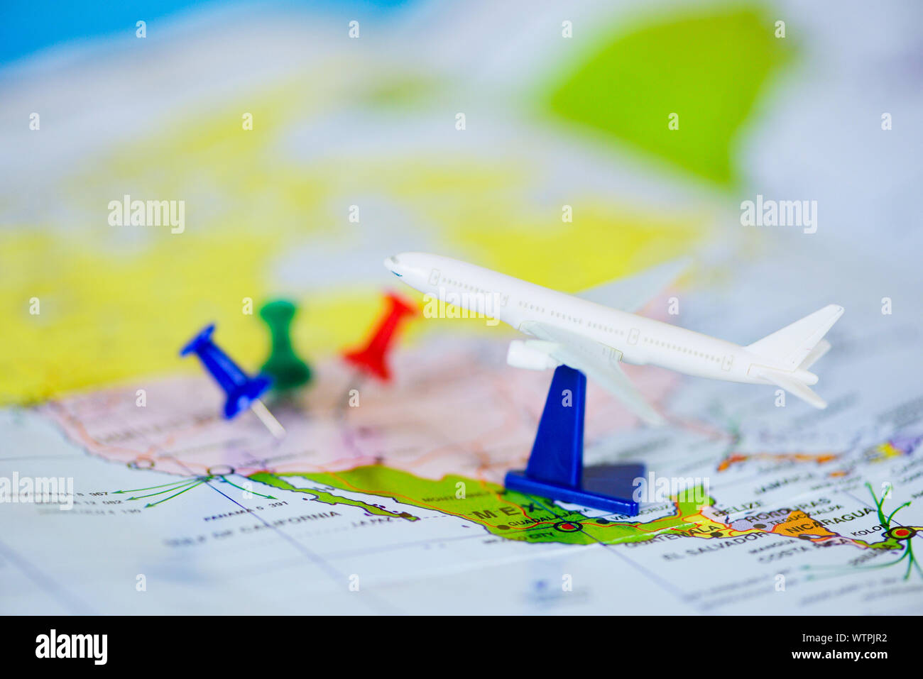 Travel planning with airplane destination points on a map pin / travel ...