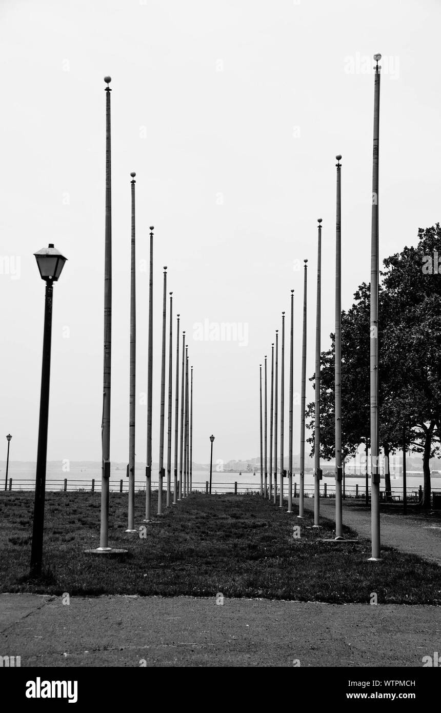 Row of flag poles hi-res stock photography and images - Alamy