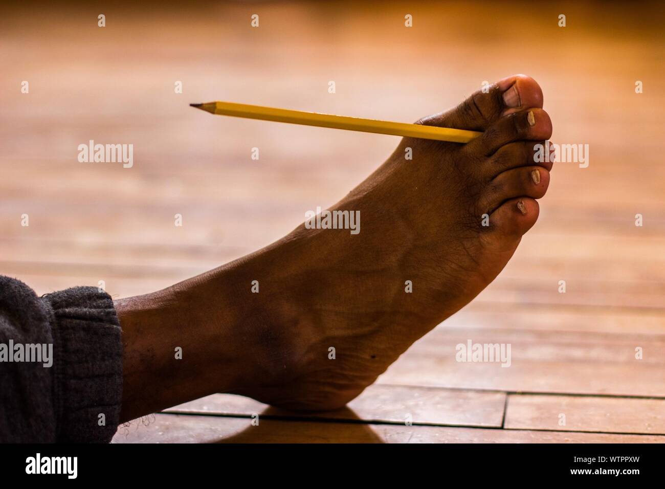 Holding toes hi-res stock photography and images - Alamy