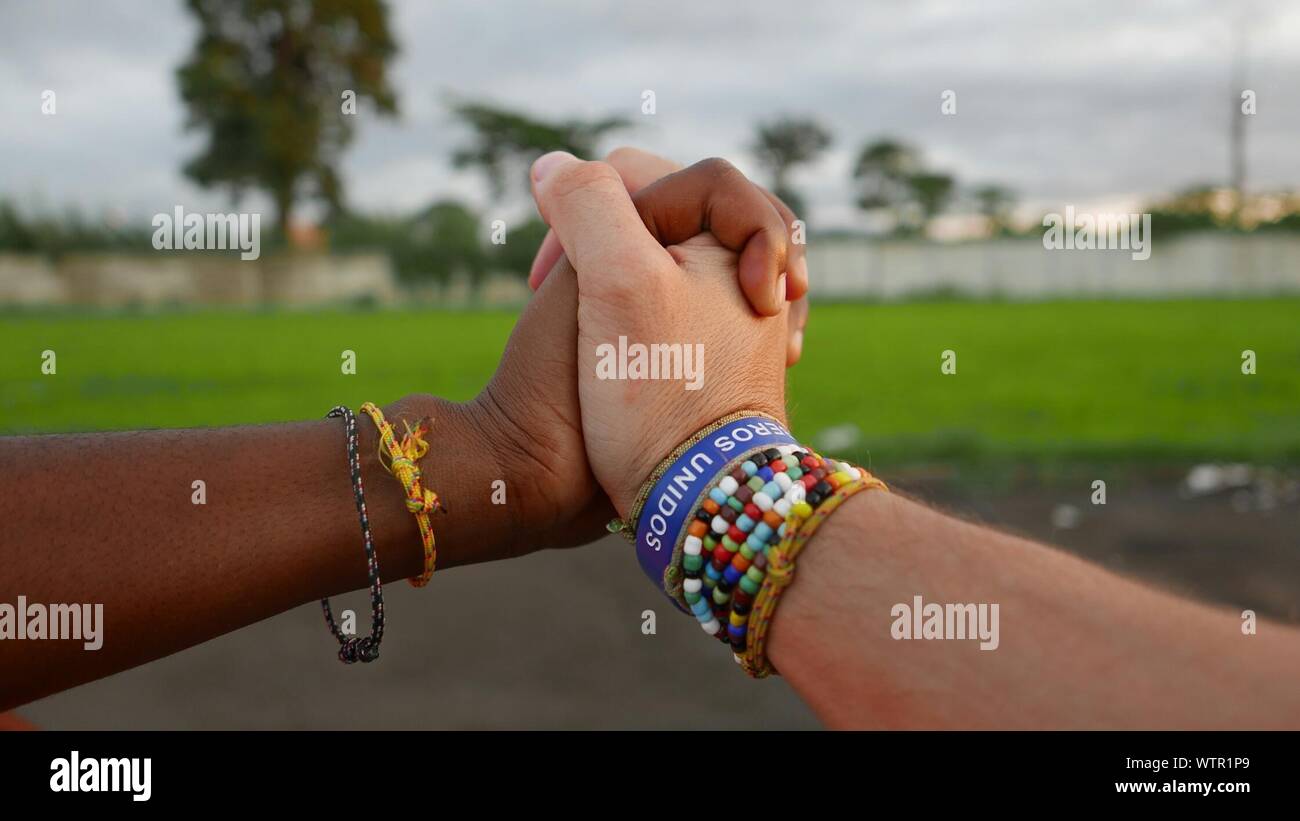 Intertwined Hands High Resolution Stock Photography and Images - Alamy